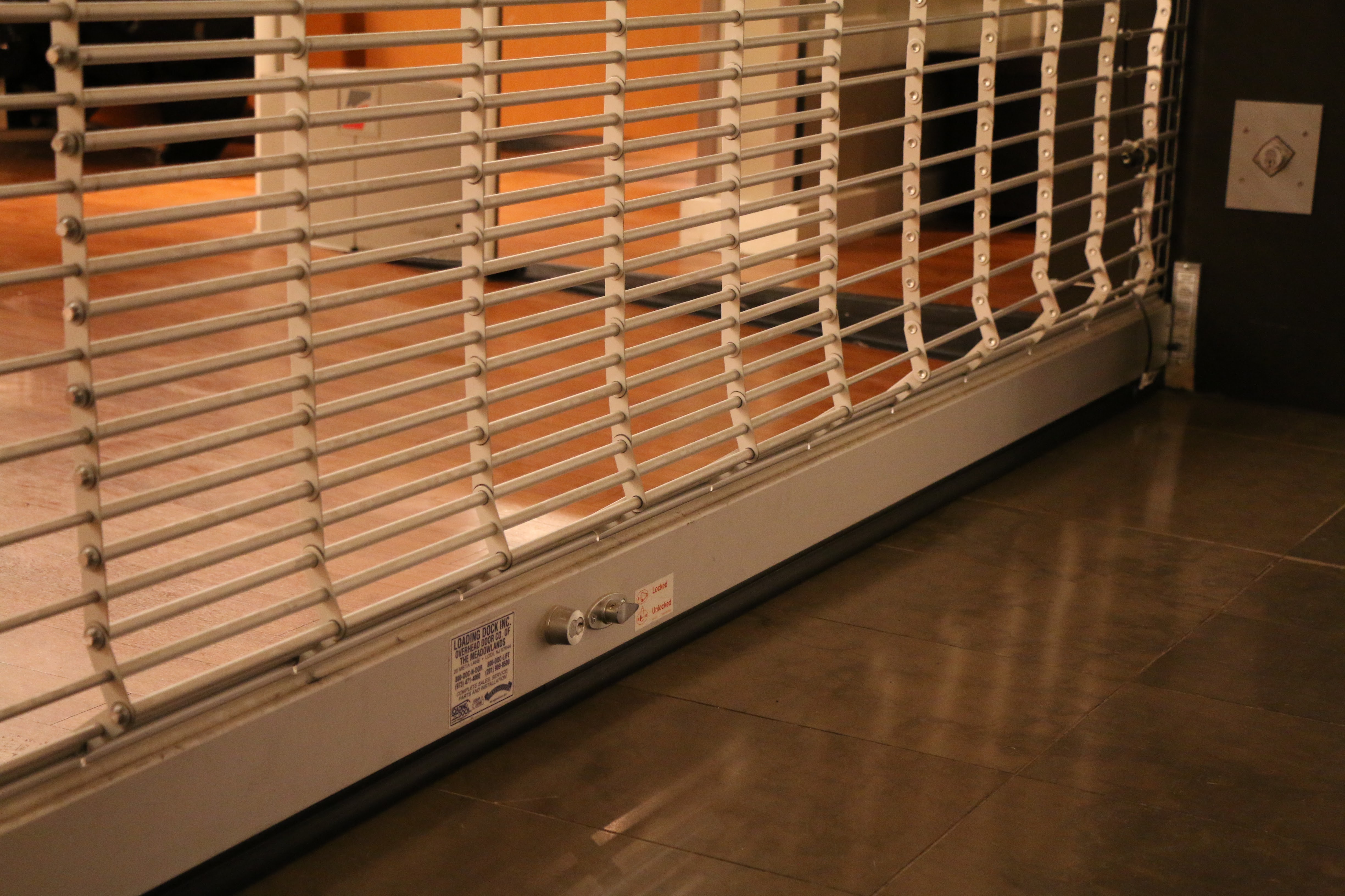 Security Grilles: Upward-Coiling & Side-Folding Doors
